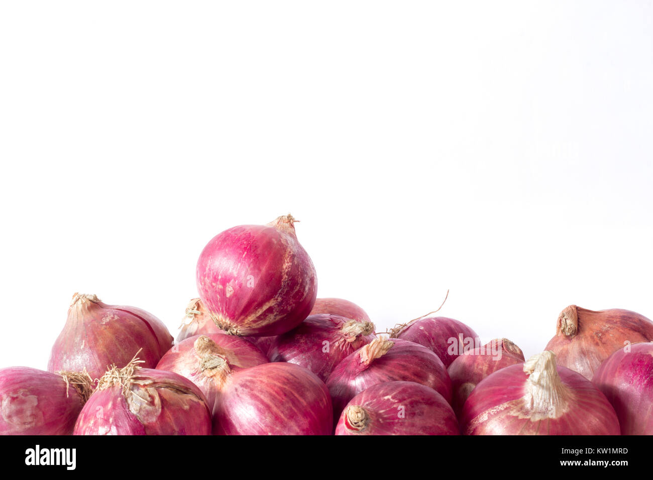 Onions on the floor, Front view Stock Photo - Alamy