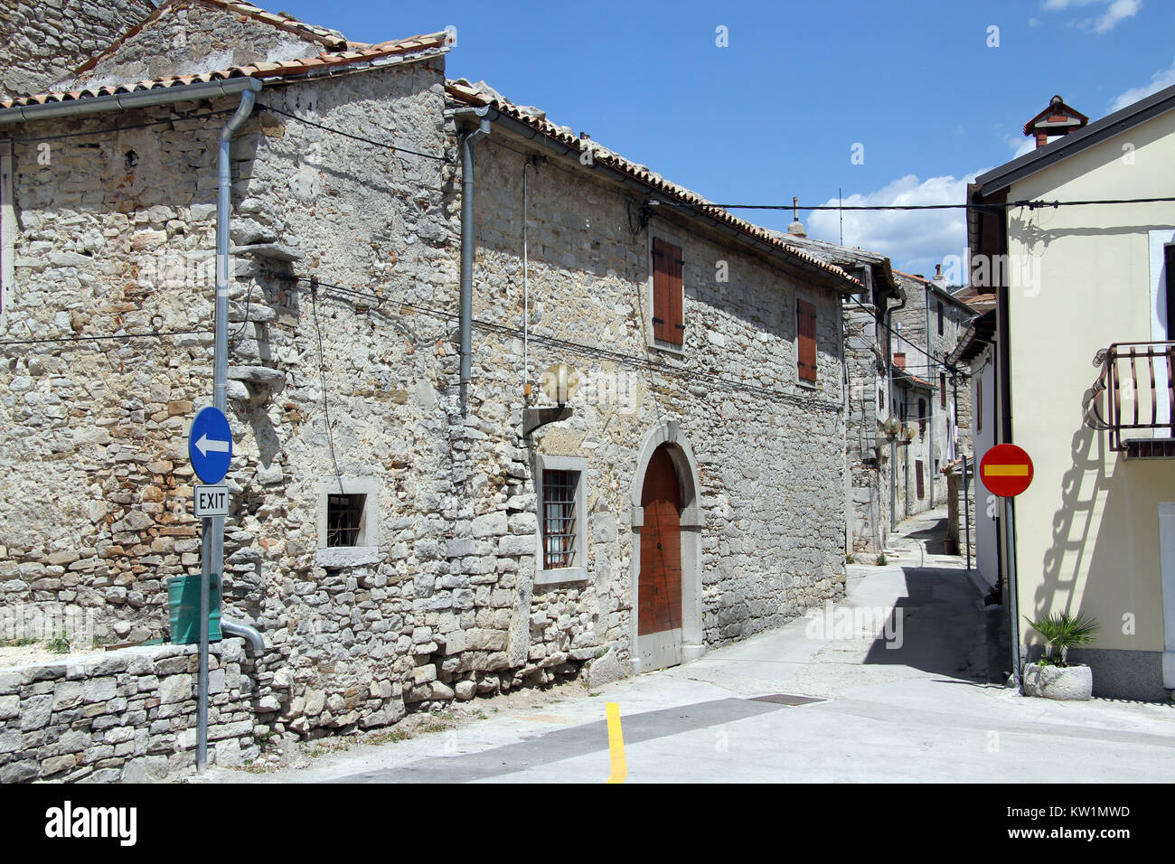 Old stone houses on the street in Buzet, Croatia Stock Photo - Alamy