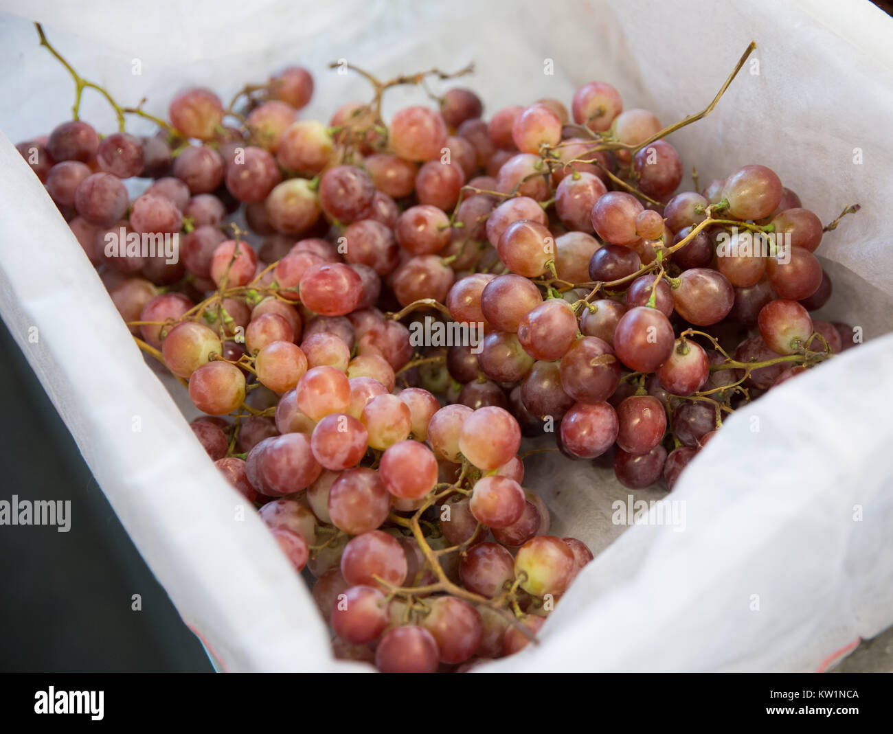Grape in white box Stock Photo - Alamy