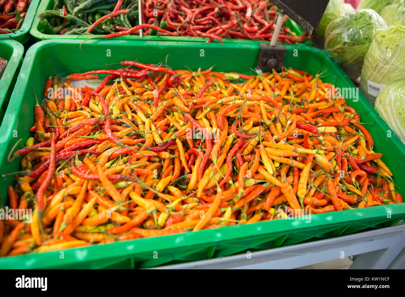 Chilli pepper on the stall in the market, asian herbs Stock Photo - Alamy