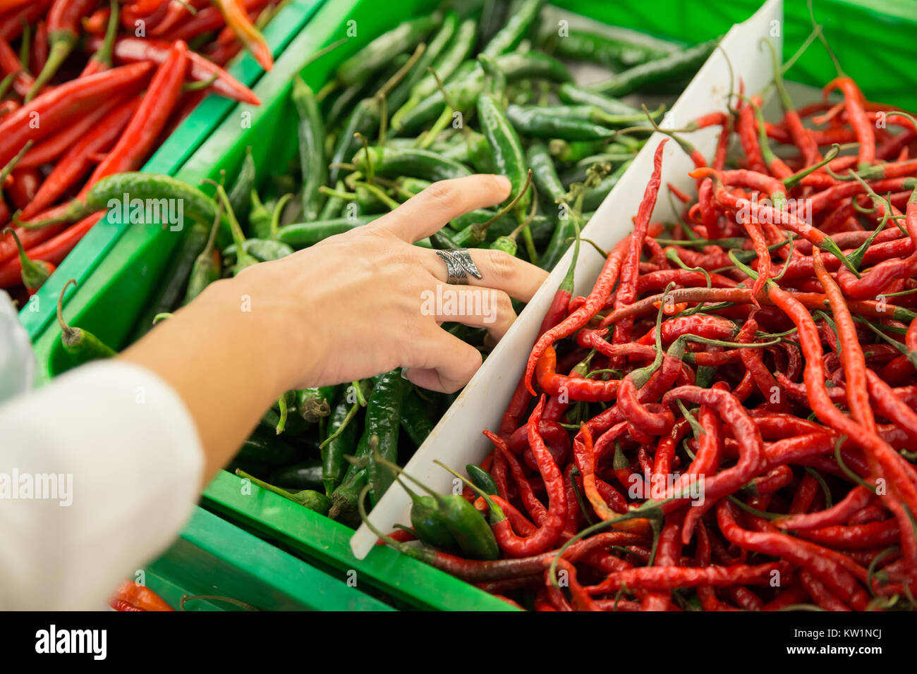 Chilli pepper on the stall in the market, asian herbs Stock Photo - Alamy