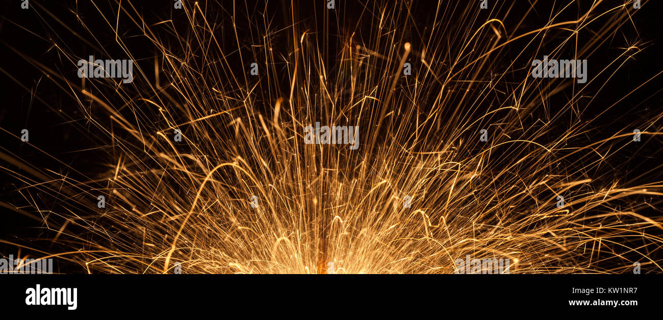 Burning sparkler on black background Stock Photo - Alamy