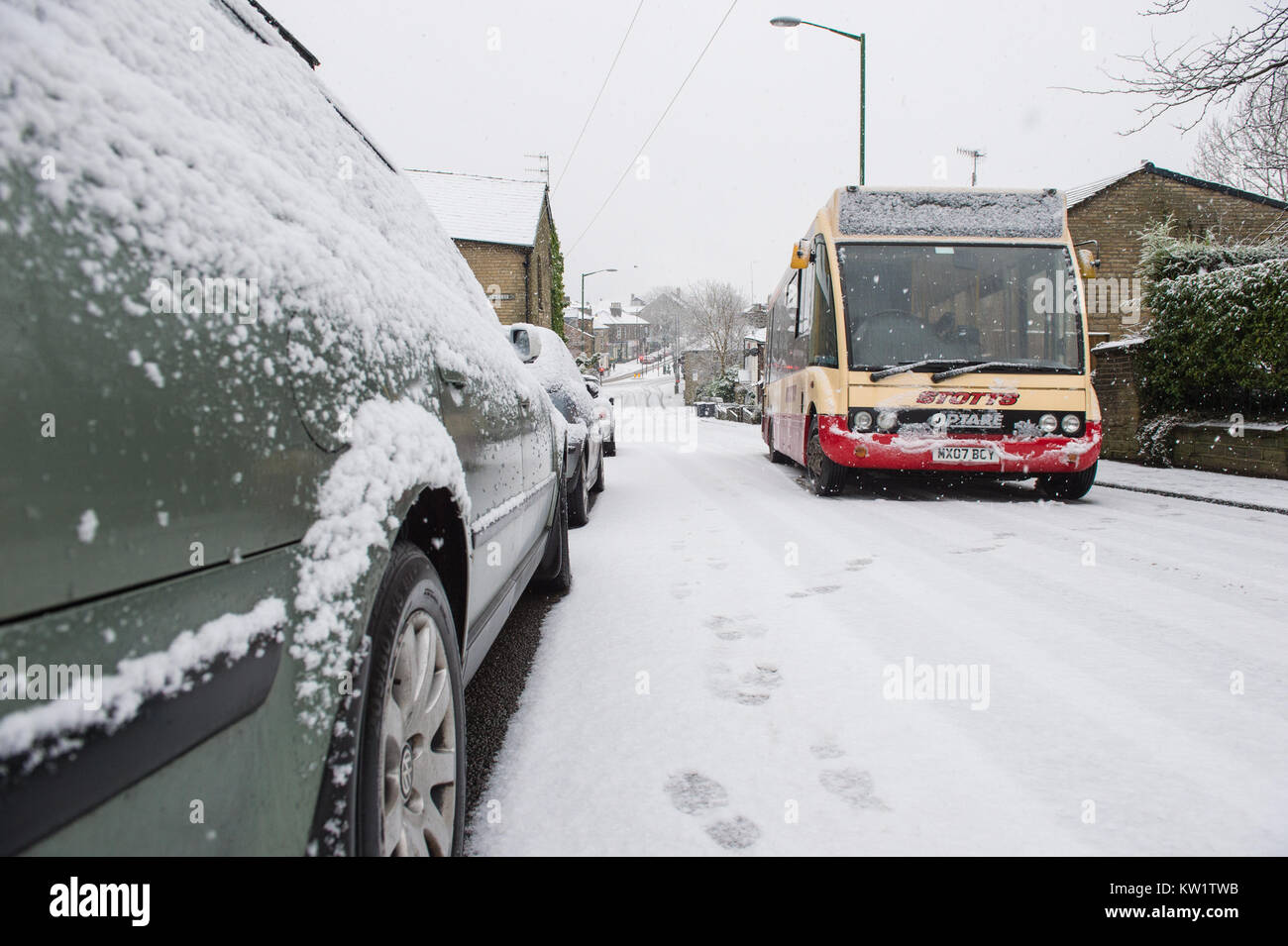 Manchester, UK. 29th Dec, 2017. A bus is stranded after snowfall on ...