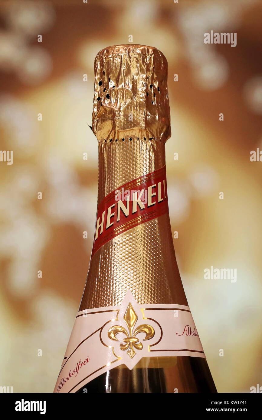 A champagne bottle with the logo of Henkell & Co. Sektkellerei KG at ...