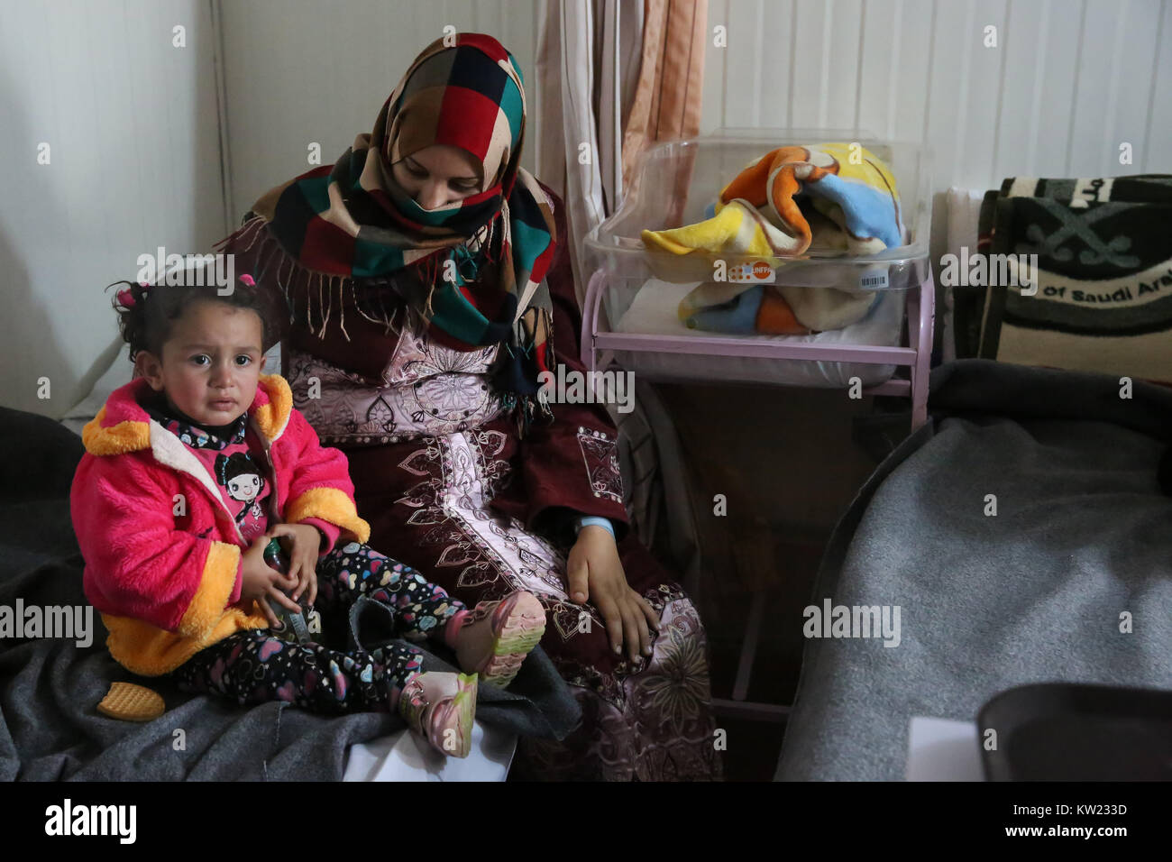 Woman escaping with child hi-res stock photography and images - Alamy