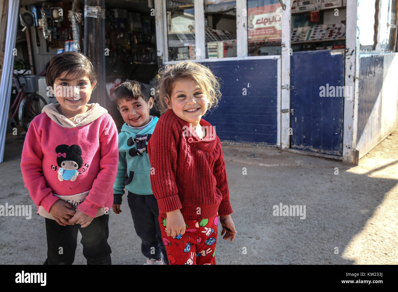 Jordan. 21st Jan, 2017. Children pose on the main market street in ...