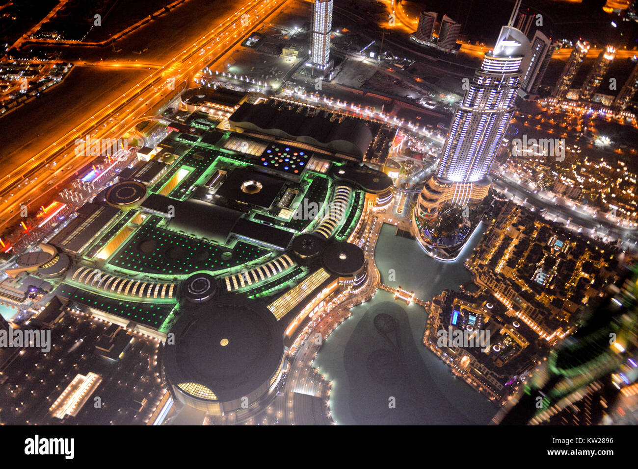 Aerial view of the skyline in Dubai, United Arab Emirates at night ...
