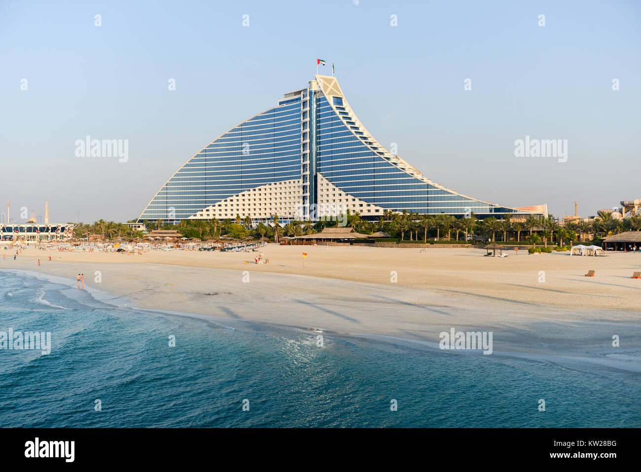 Dubai, UAE - November 25, 2012: Jumeirah Beach Hotel in Dubai. This wave-shaped hotel ...