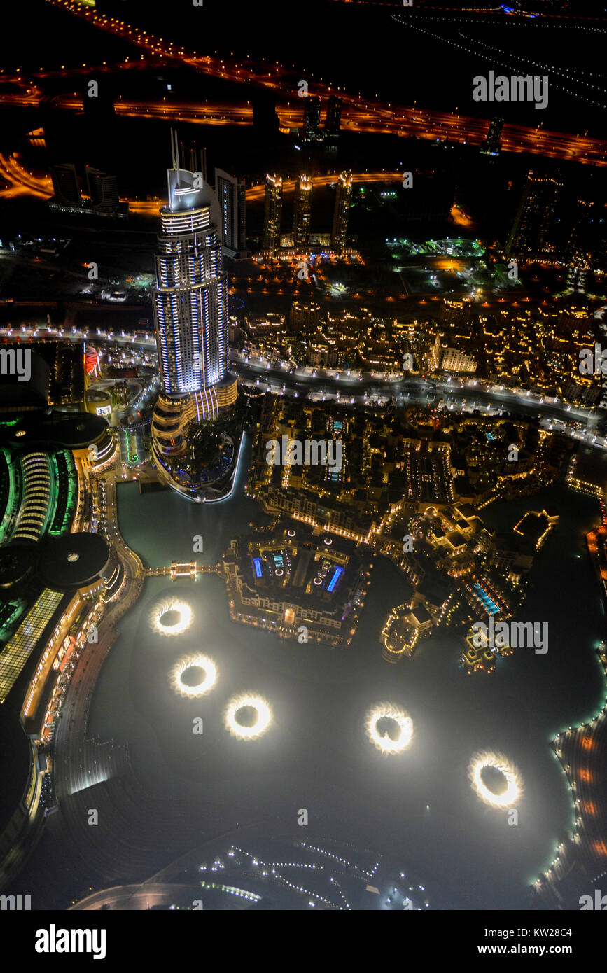 Aerial view of the skyline in Dubai, United Arab Emirates at night ...