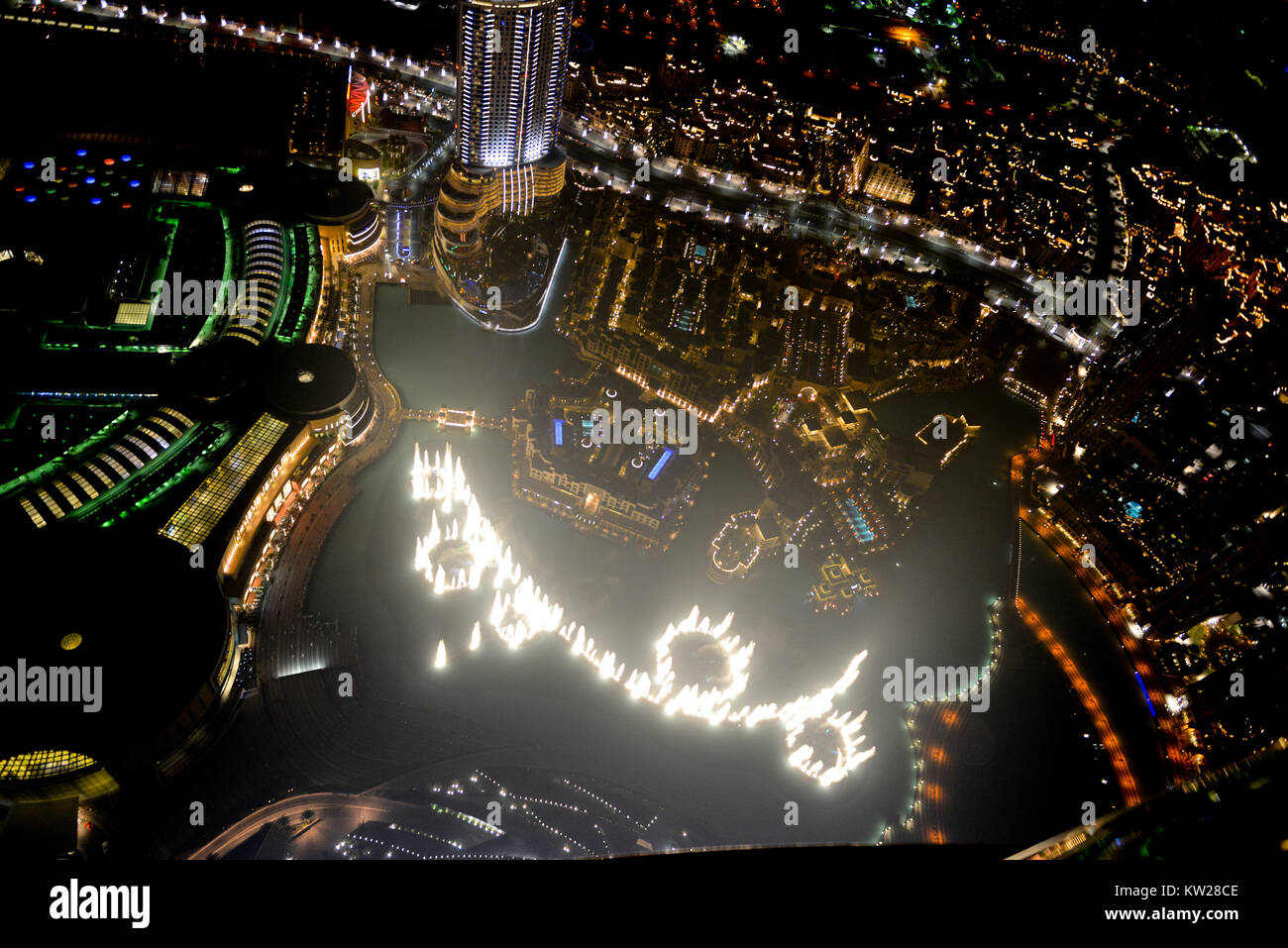 Aerial view of the skyline in Dubai, United Arab Emirates at night ...