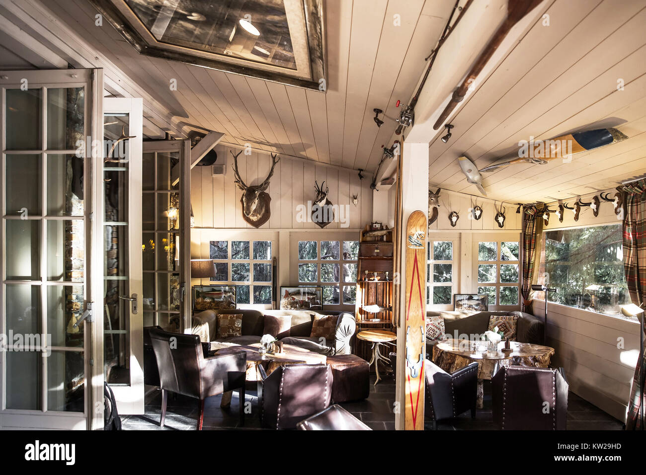 Restaurant in vintage style, lamps, chair and leather sofa Stock Photo ...