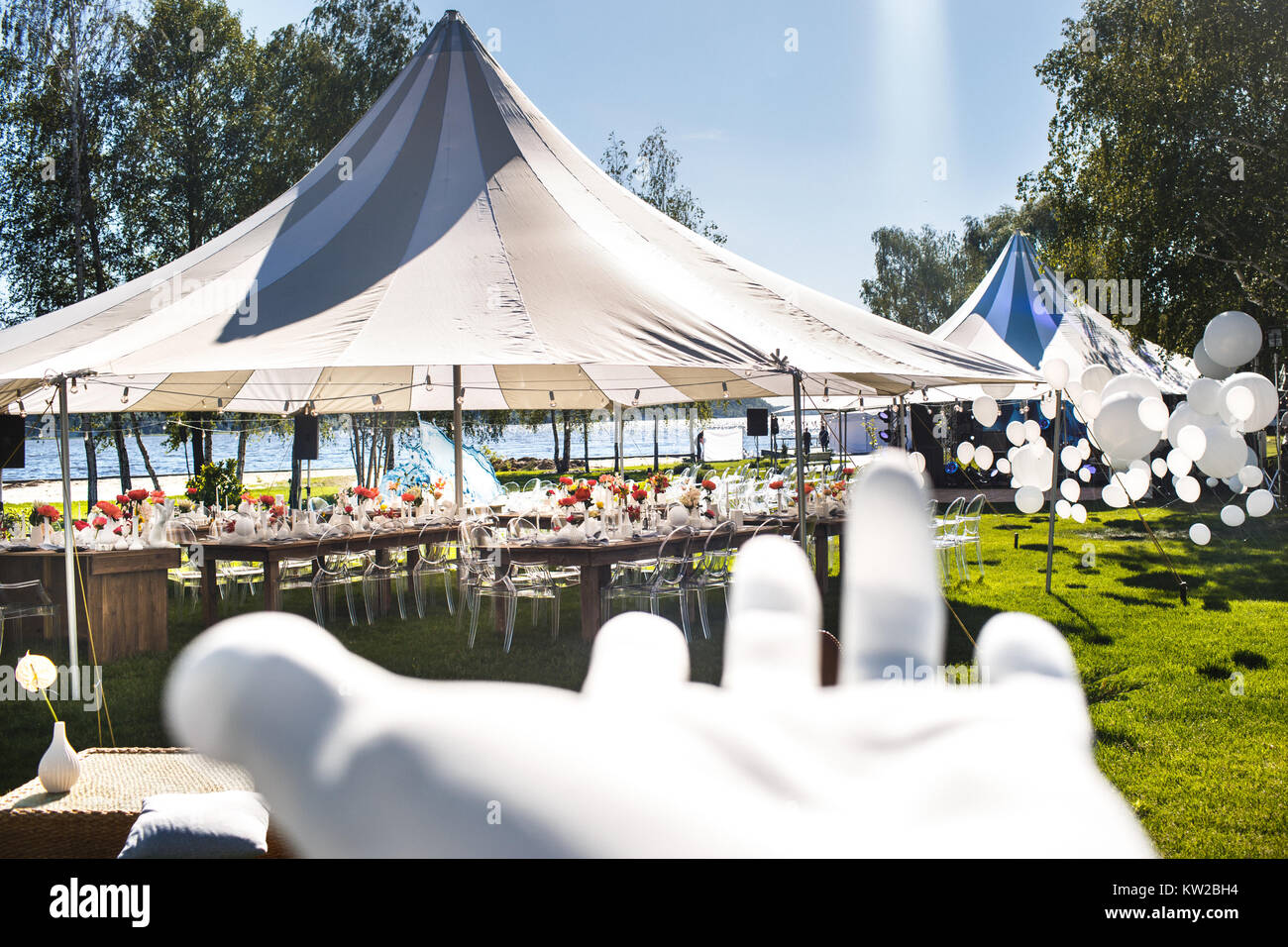 Wedding tent with large balls. Tables sets for wedding or another ...