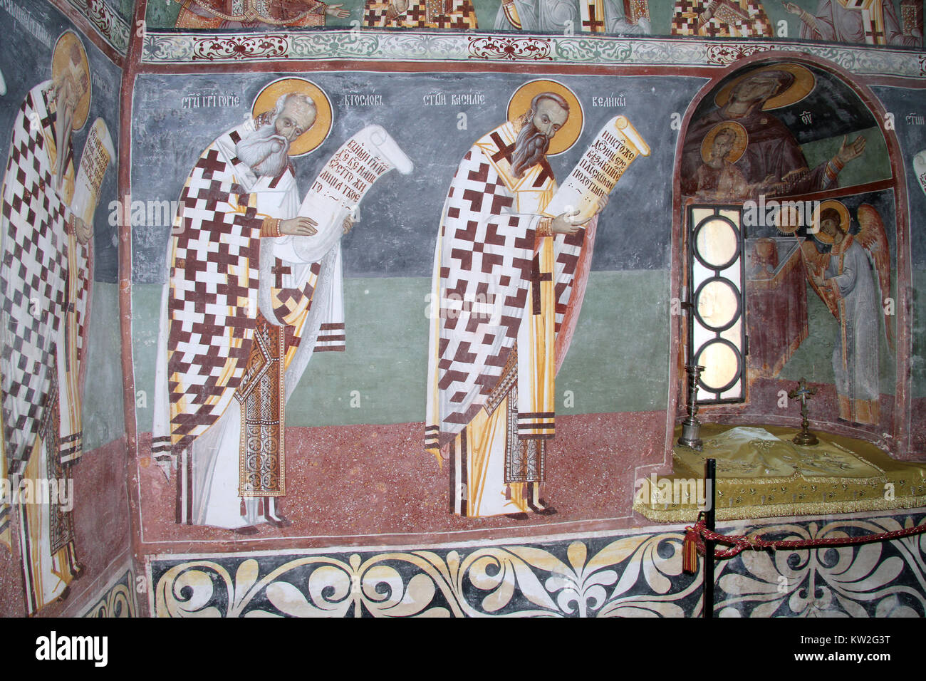 Pictures on the wall and window of church in monastery Moracha ...