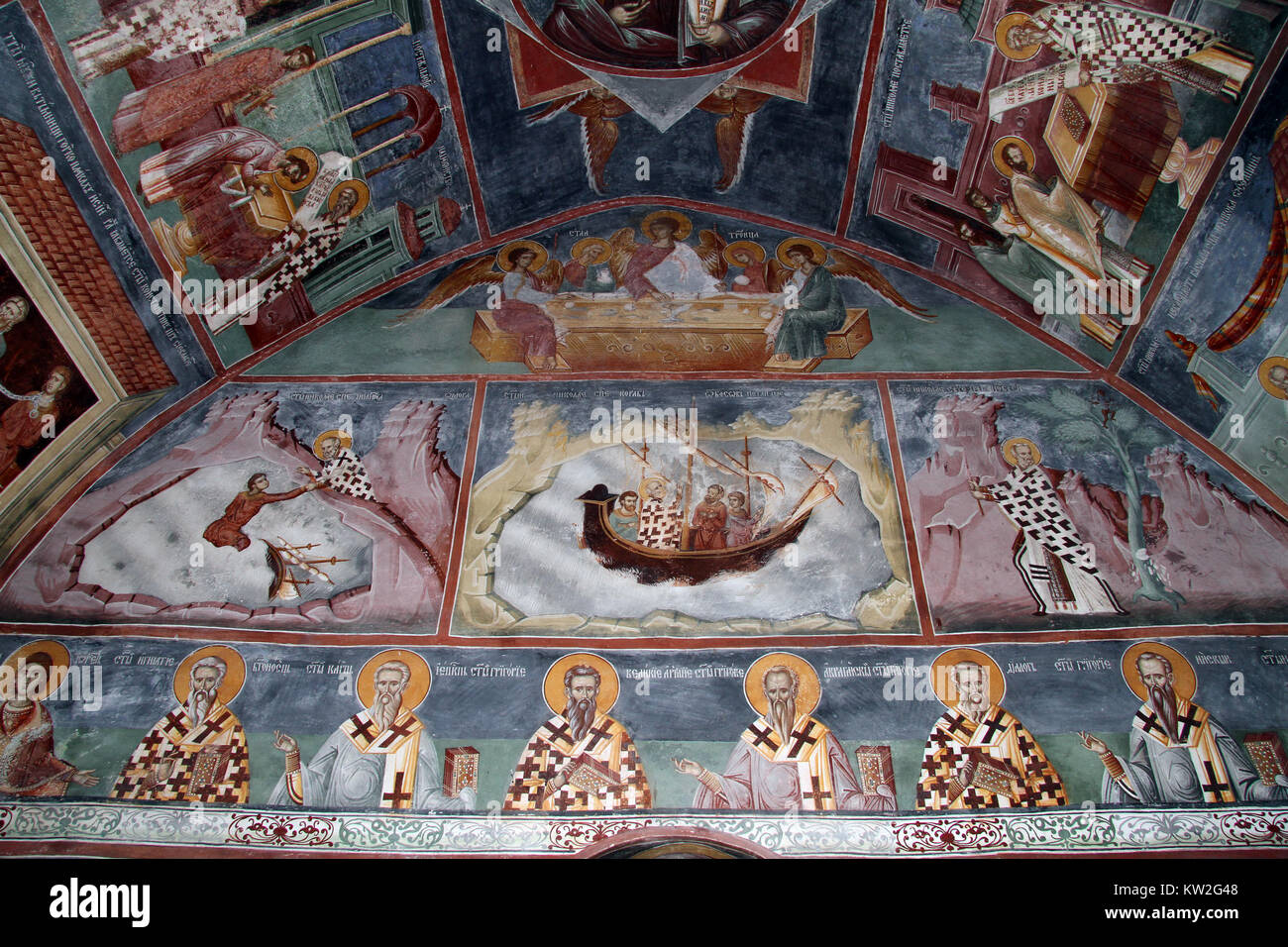 Pictures on the wall and roof of church in Moracha monastery ...