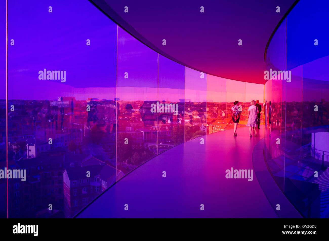 Visitors enjoy the Rainbow panorama of Aarhus at Aros Art Museum. The ...