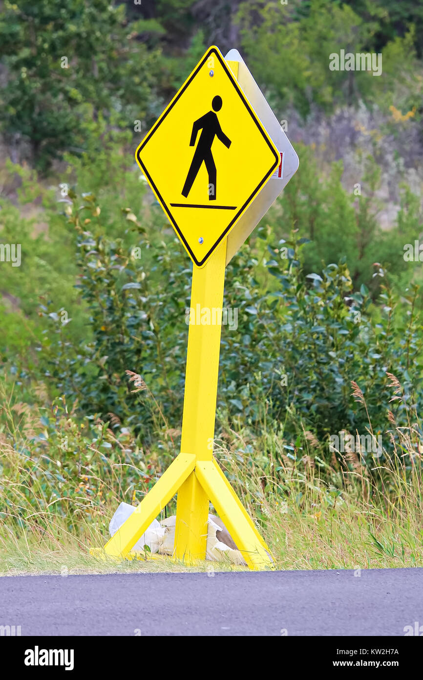 A pedestrian crossing sign on a highway Stock Photo - Alamy