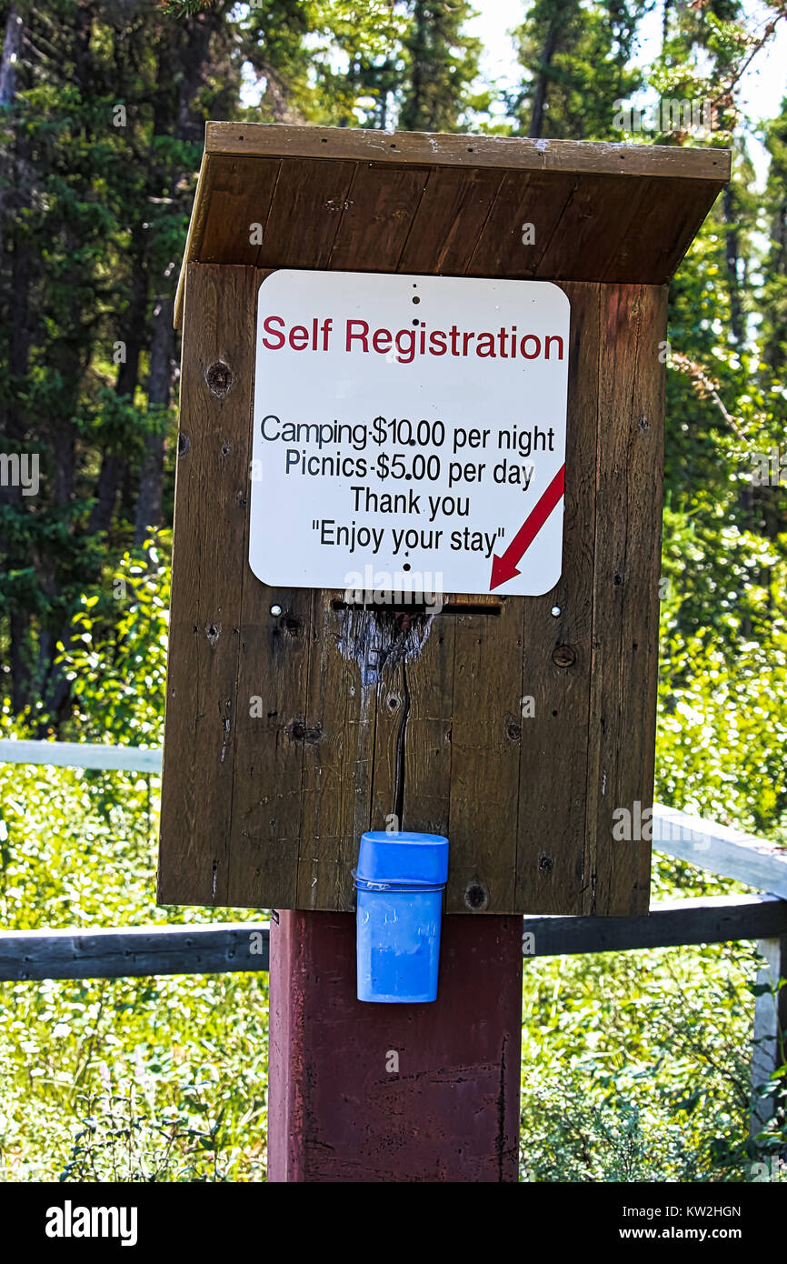 A self registration box with prices and money deposit Stock Photo - Alamy