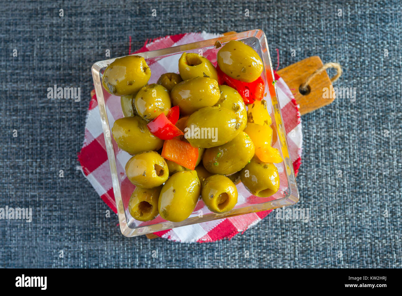 pitted olives seasoned with olive oil and spicy pepper Stock Photo - Alamy