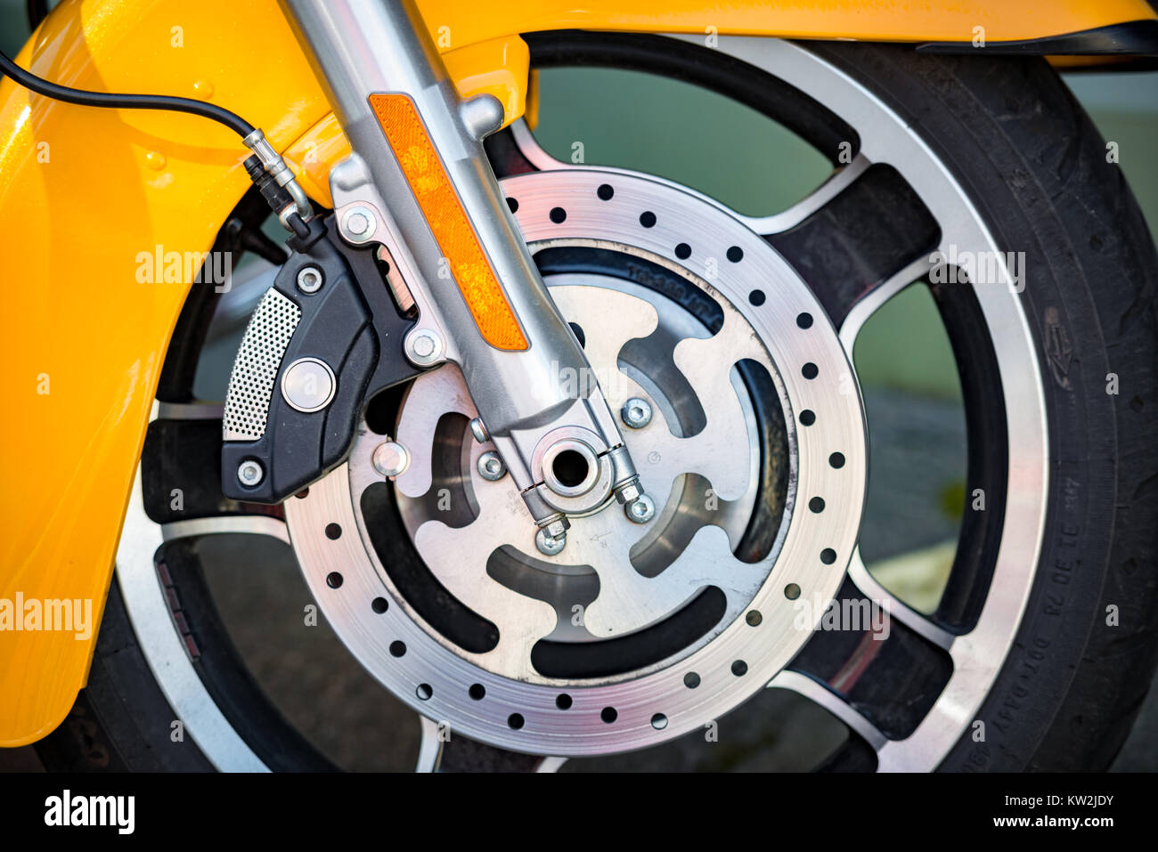 Close up view of motorcycle wheel in street Stock Photo - Alamy