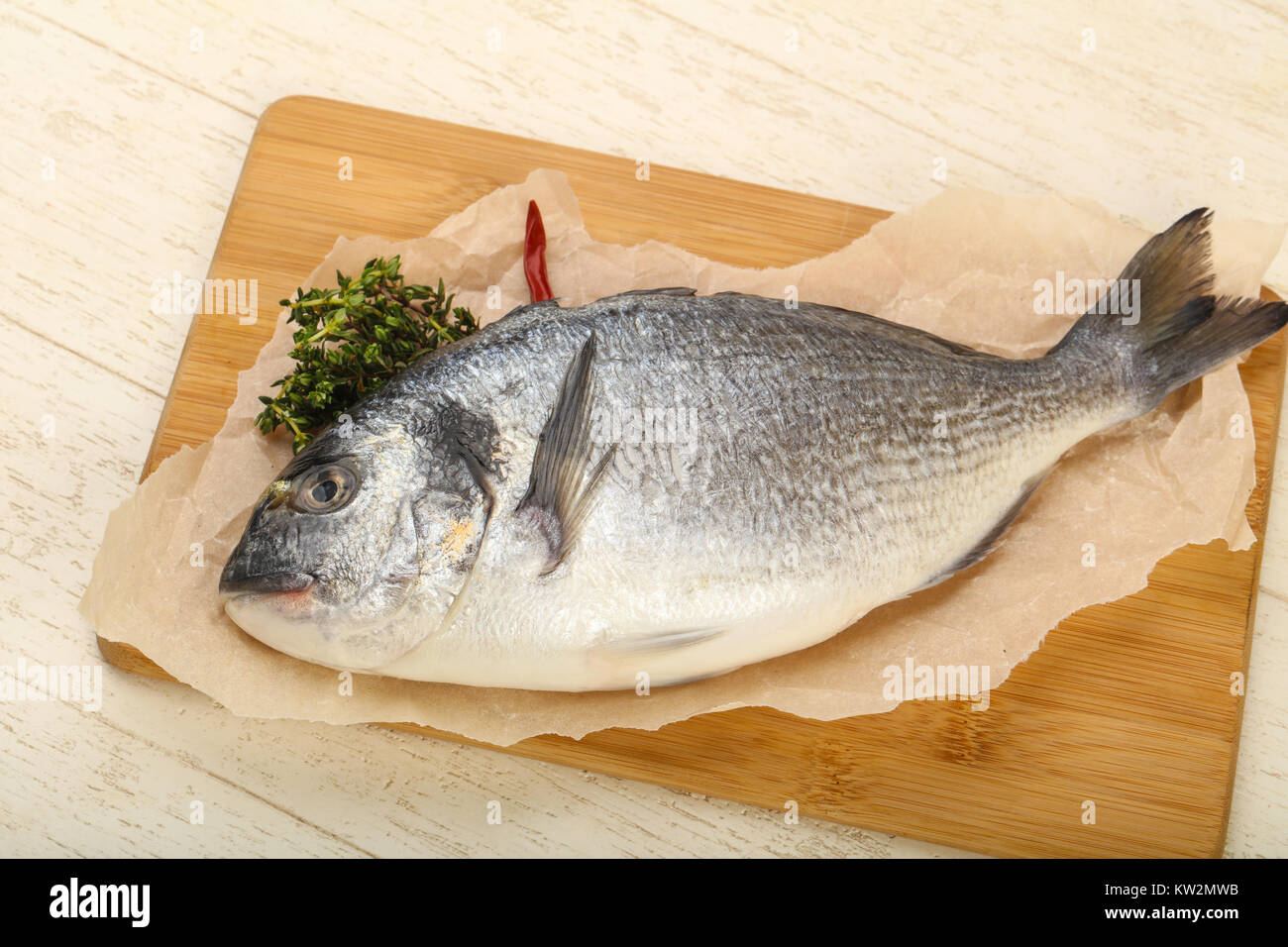 raw dorada fish - ready for cooking Stock Photo - Alamy