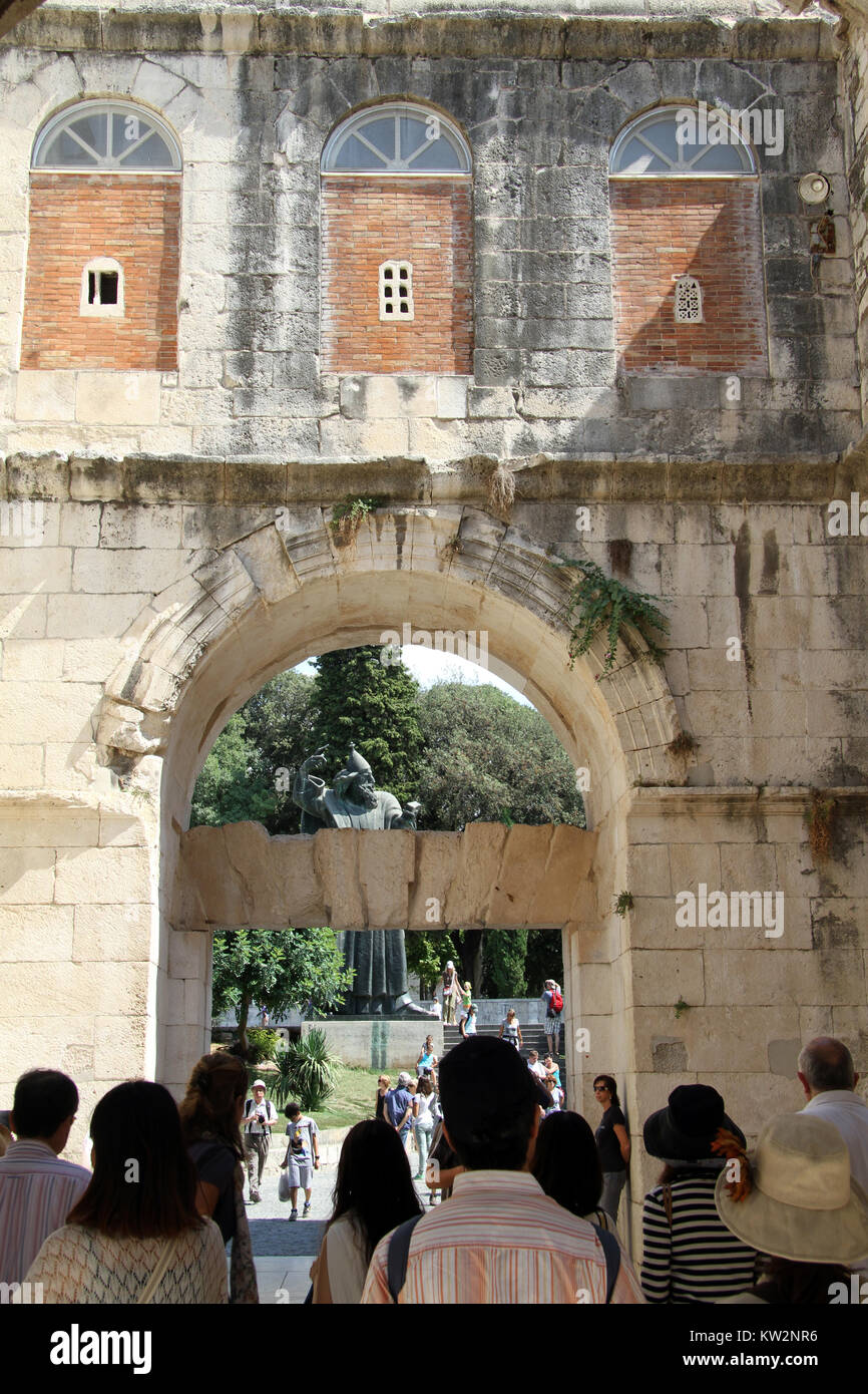 Tourists and Golden gate of old Split, Croatia Stock Photo - Alamy