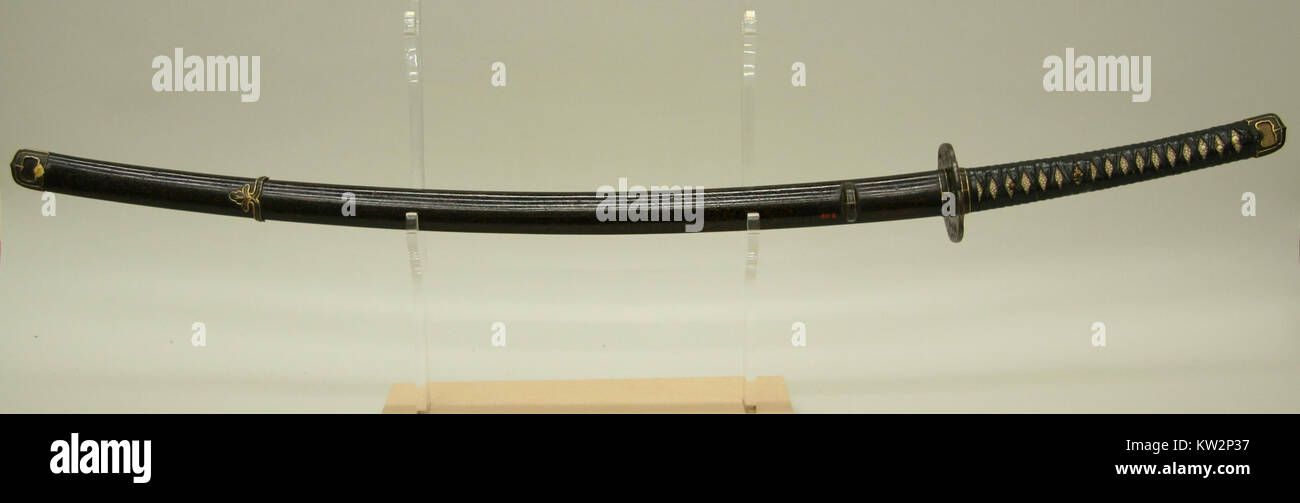 This blade and its mounting belong to a katana, a traditional Japanese ...