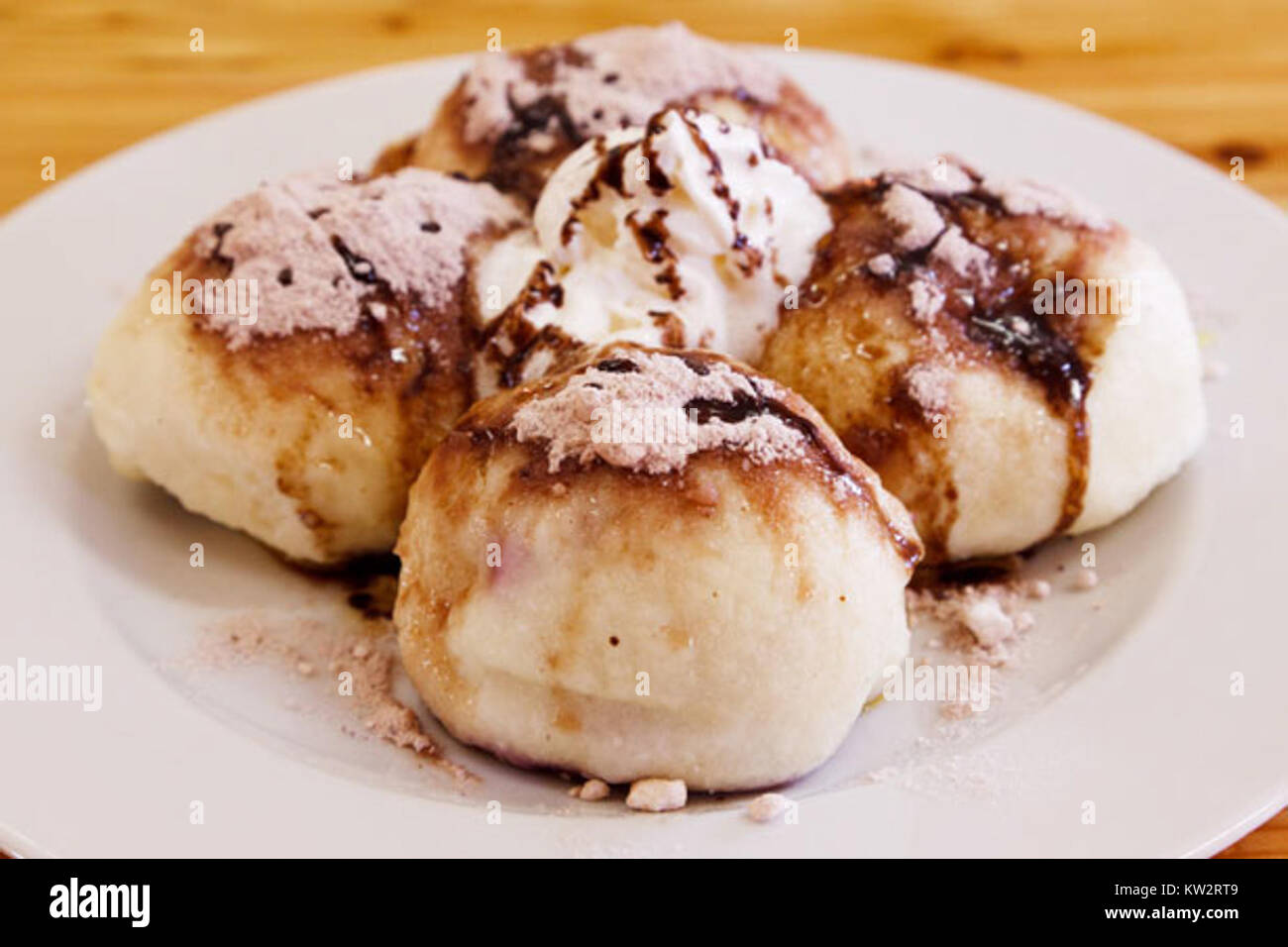 Blueberry dumplings are a traditional dish often served as a dessert ...