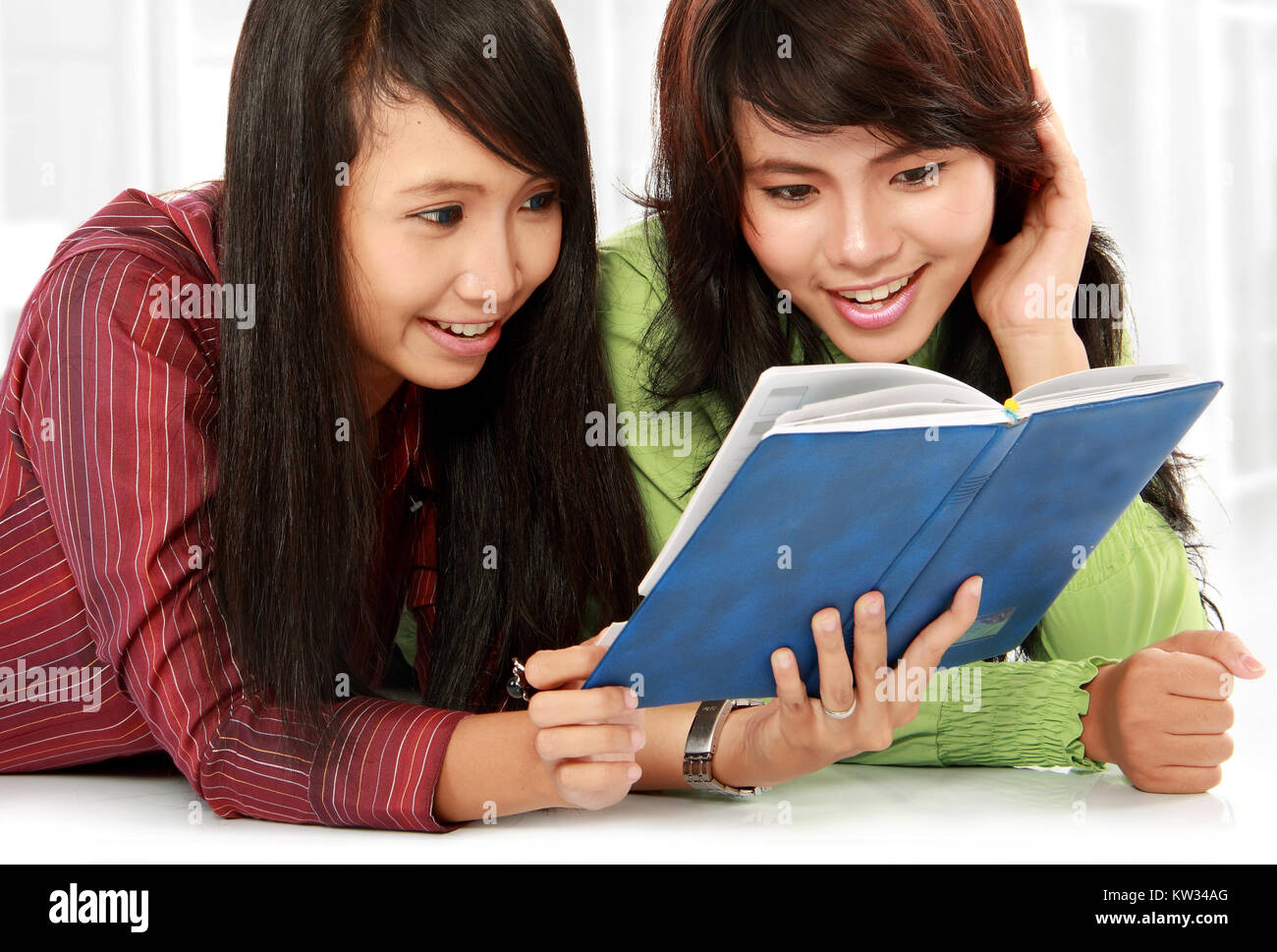 College girls sharing room reading hi-res stock photography and images ...