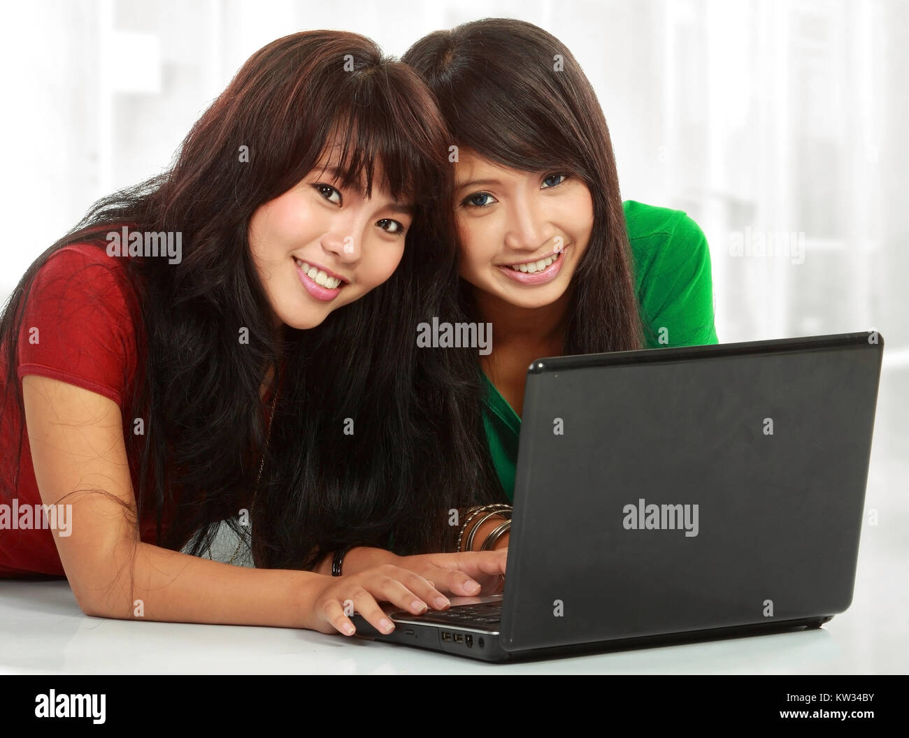 girl using laptop Stock Photo - Alamy