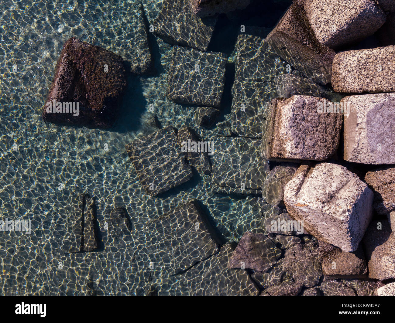 Aerial view of rocks on the sea. Overview of the seabed seen from above ...