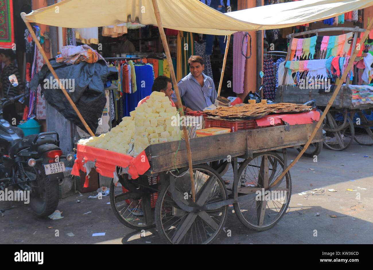 People sell Indian sweets at street market in Jaipur India Stock Photo ...