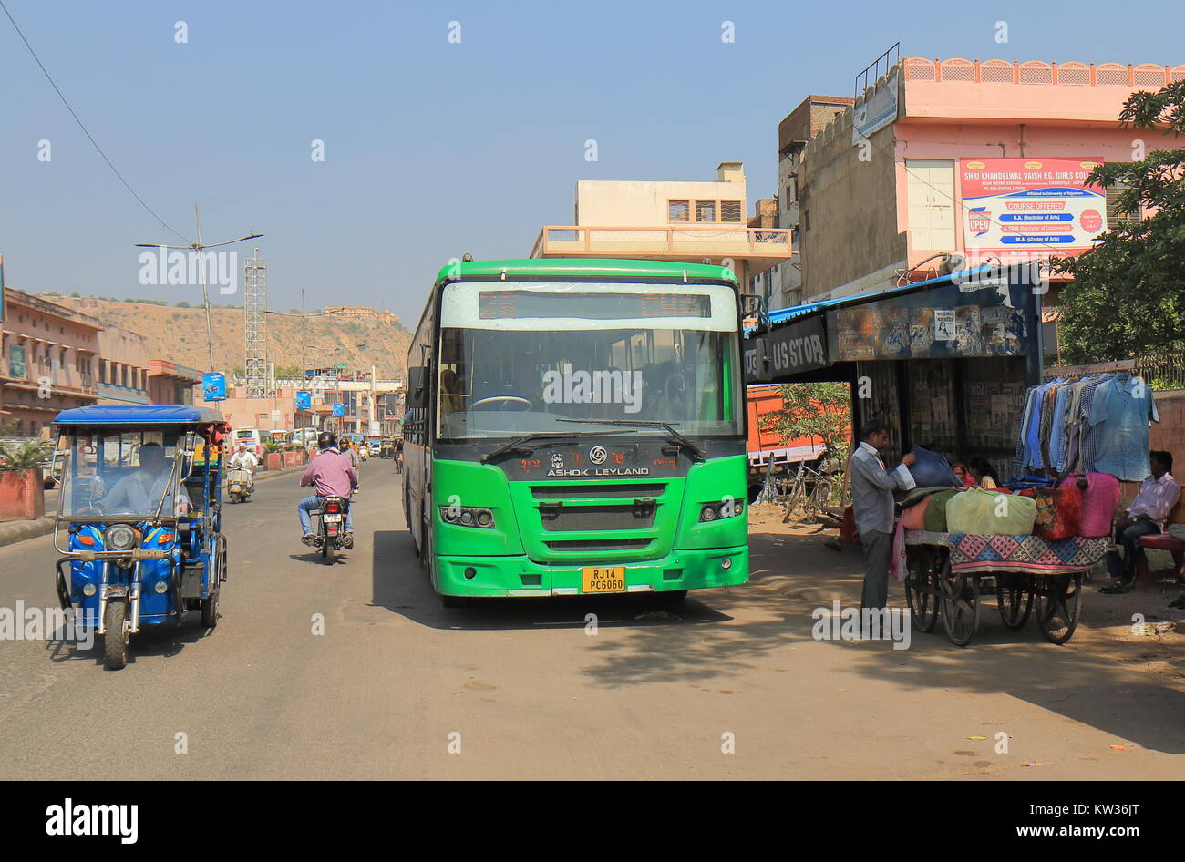 City bus runs in downtown Jaipur India Stock Photo - Alamy