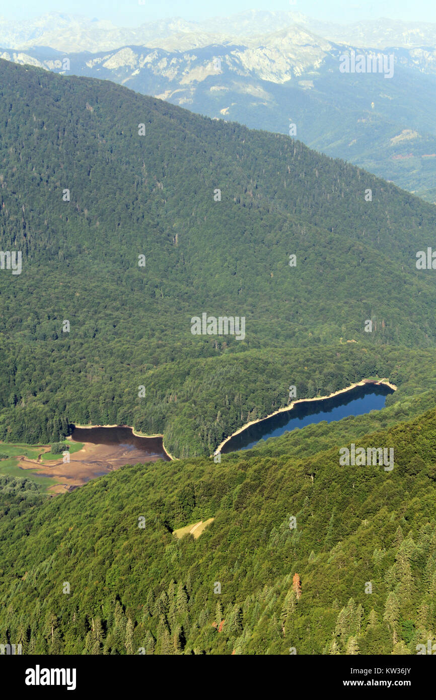 Two lakes in the forest in Beogradsko ezero national park, Montenegro ...
