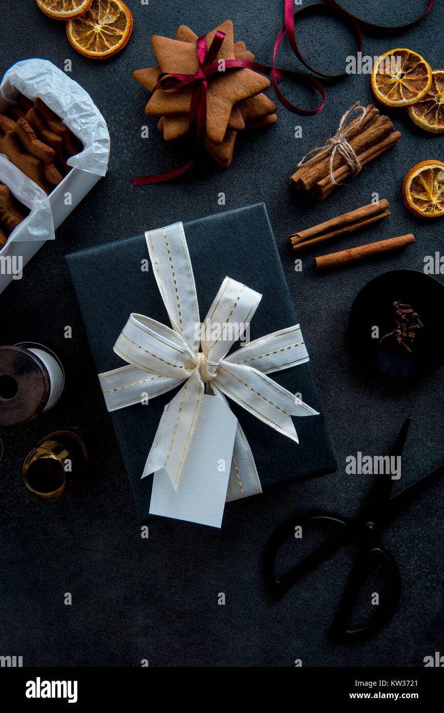 Gift wrapping for Christmas. Top view of table with gift in stylish ...