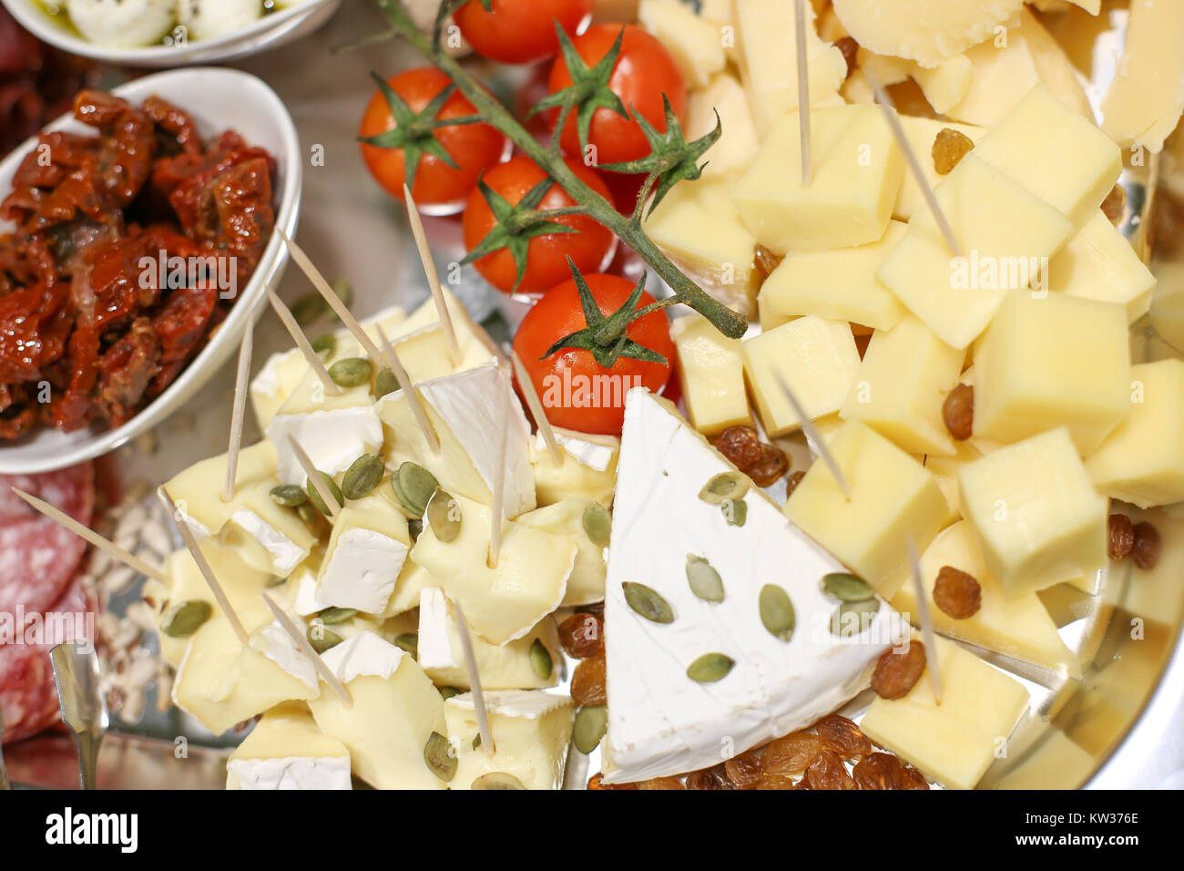 Nice mediterranean appetizers plating with cheese close up Stock Photo ...