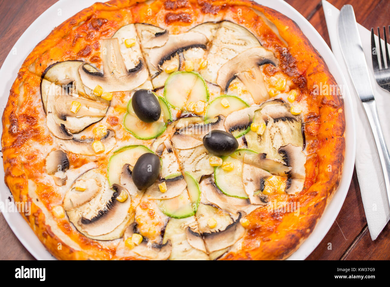 Top view of vegetable restaurant pizza on a table Stock Photo - Alamy