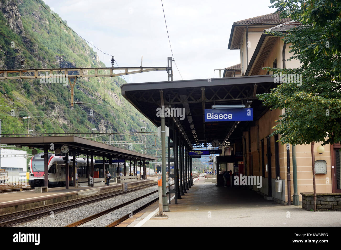 BIASCA, SWITZERLAND - CIRCA AUGUST 2015 Train on the platfort near ...