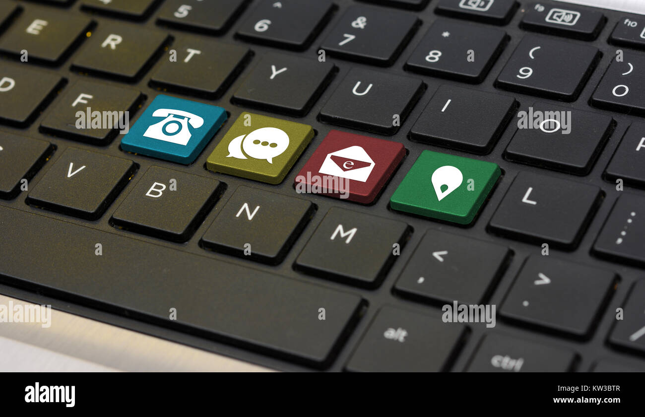 Contact Us Means Icons on keyboard closeup Stock Photo - Alamy
