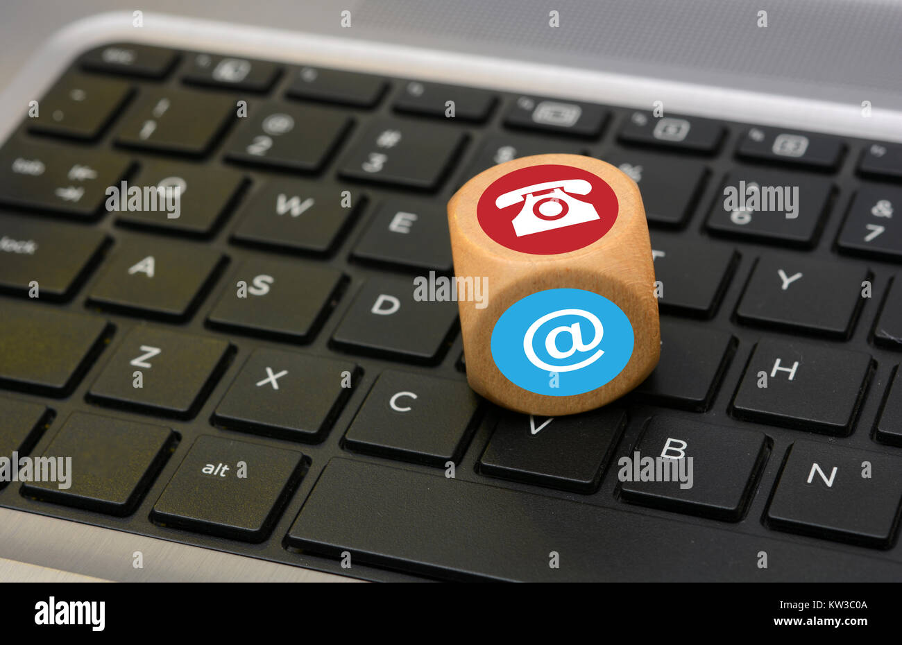 Communication Icons Email and Phone Dice on Keyboard Stock Photo - Alamy