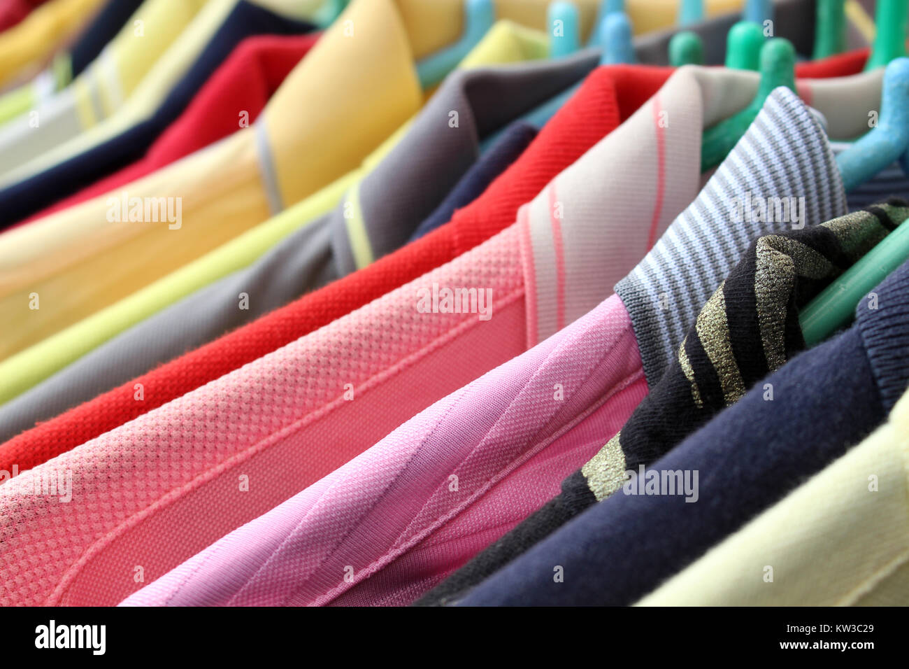 clothes hanger background Stock Photo - Alamy