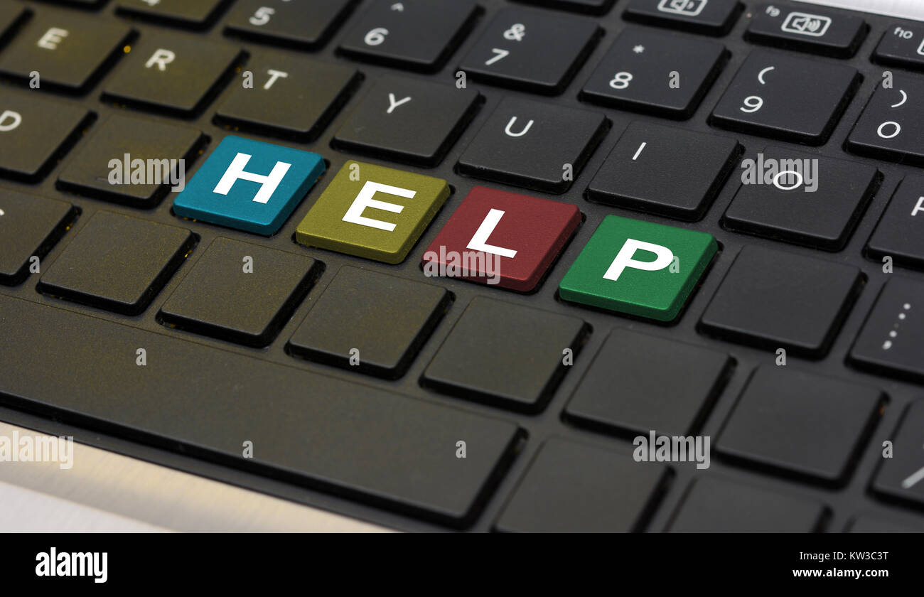 Help words on Keyboard closeup - Customer Service Idea Stock Photo - Alamy