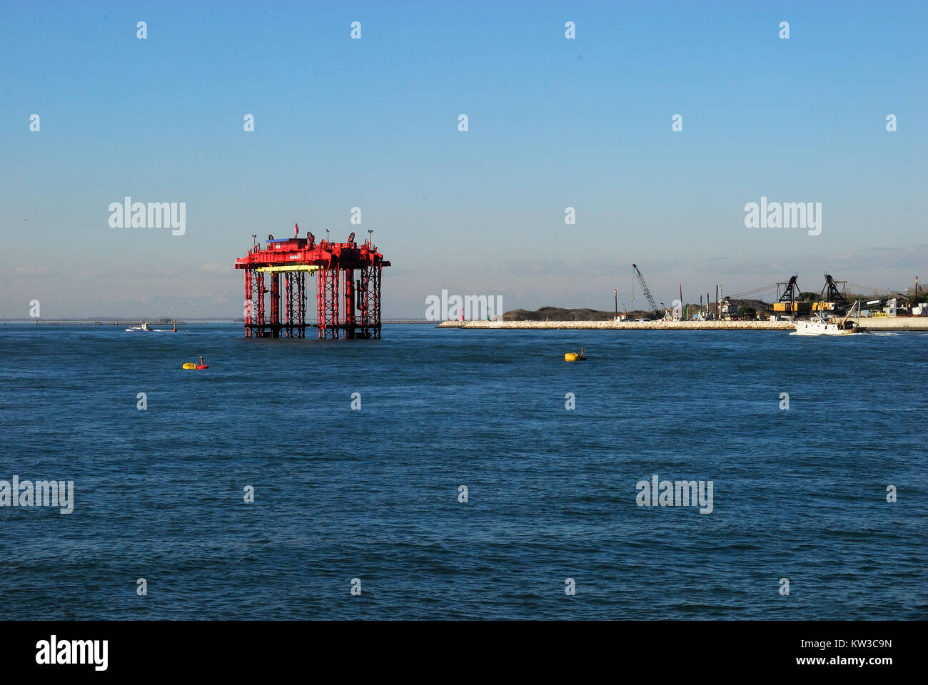 The MOSE project barrier and gantry lift at the Chioggia lagoon ...