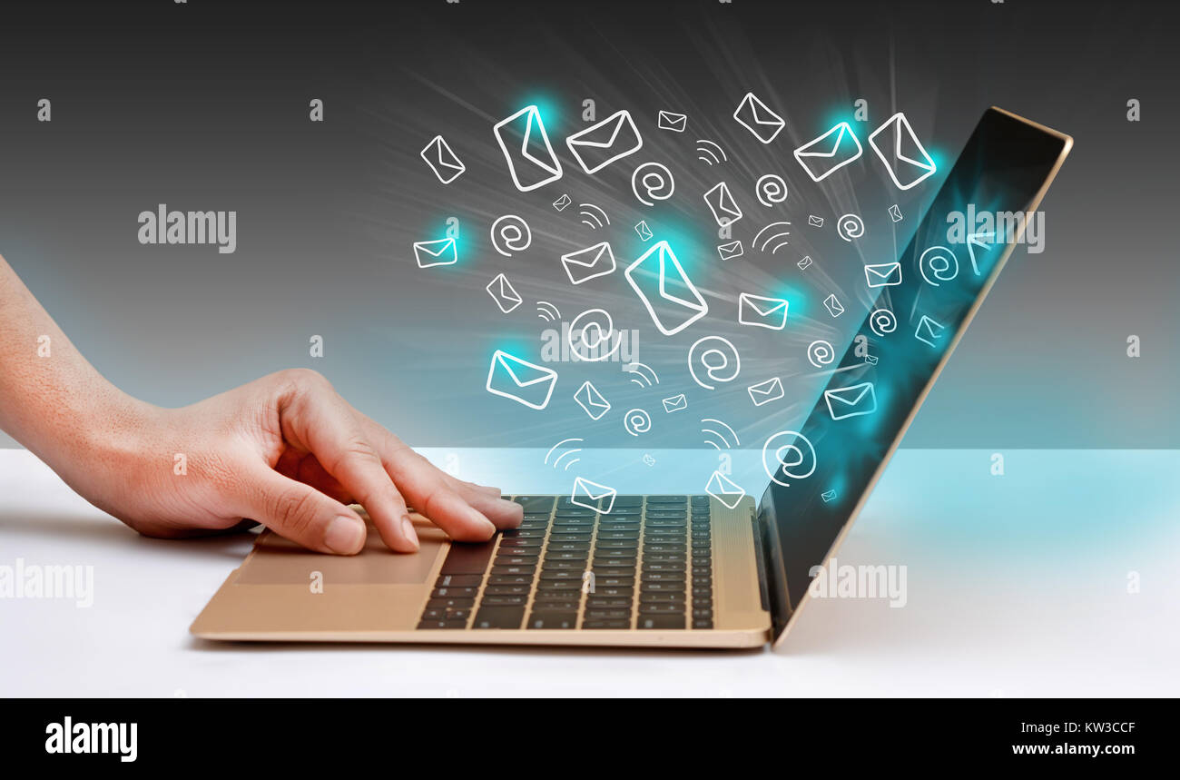 Person checking emails on laptop screen Stock Photo - Alamy