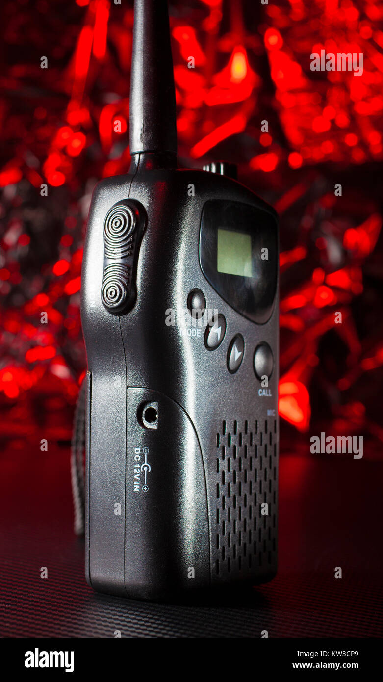 VHF walkie talkie that is on a red background Stock Photo - Alamy