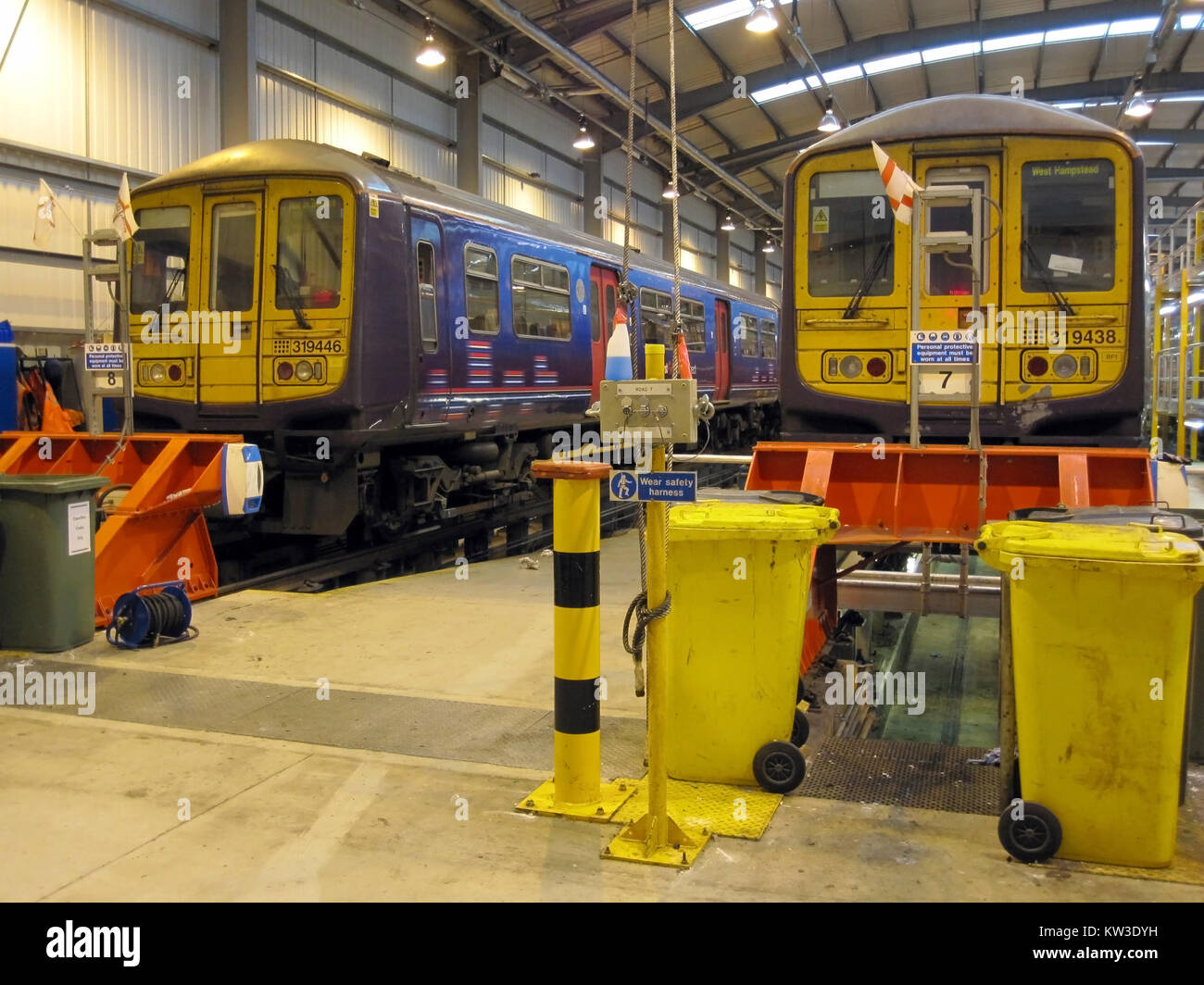 Class 319 EMUs 319446 and 319438 stand inside the former First Capital ...