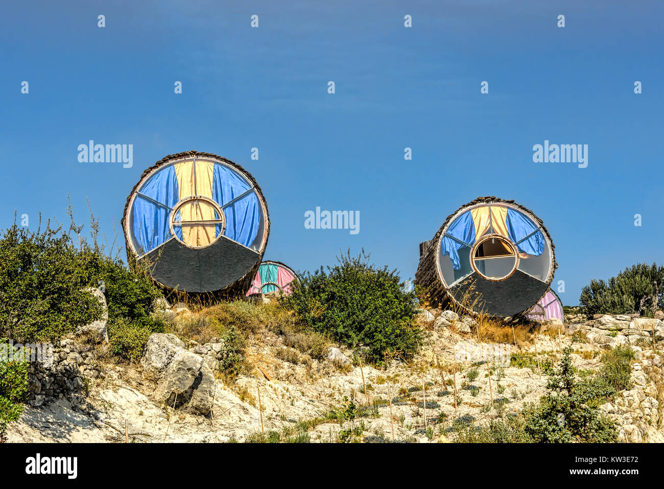 Cylindrical wooden bungalows in an organic farm Stock Photo - Alamy