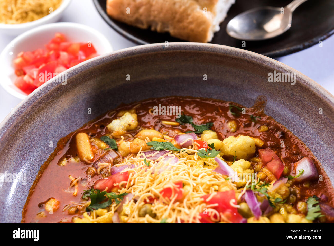Misal Pav or misalpav, Misal Pav with Farsan. Traditional Indian spicy ...