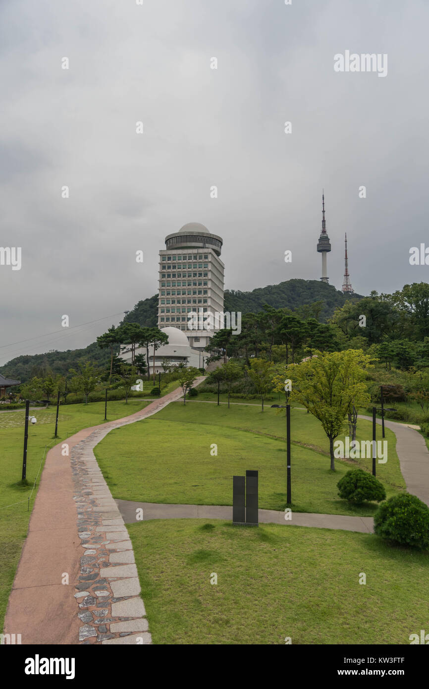 Namsan Park green space with Seoul Tower, in the background, and a ...