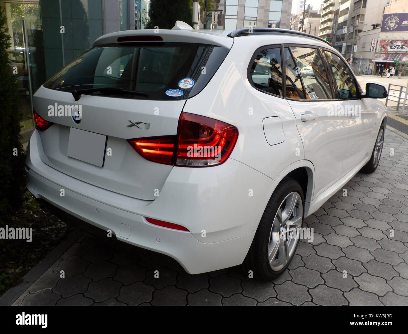 The BMW X1 xDrive20i (E84) rear refers to the rear view and design of ...