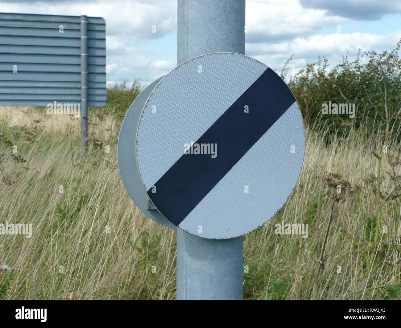 The United Kingdom national speed limit reminder sign is a traffic sign ...